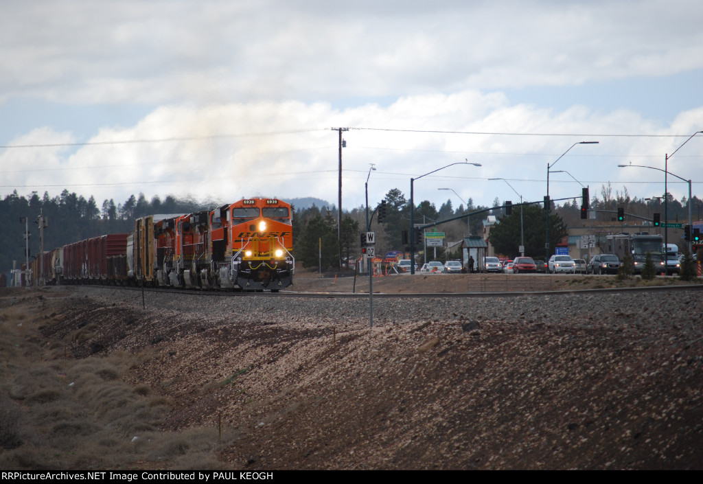 BNSF 6939 Leads a Manifest Train through East Flagstaff passed the Banning Road crossing as she ...